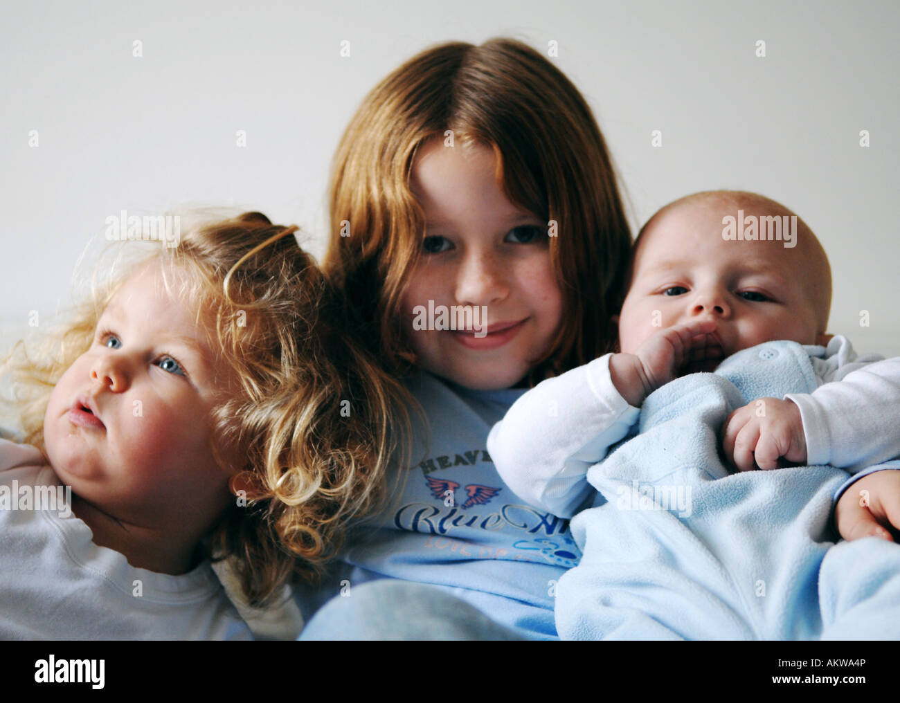 Older sister caring for siblings hi-res stock photography and images ...