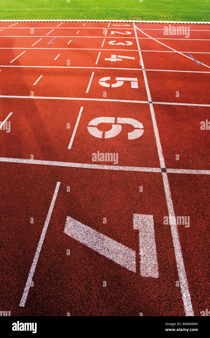Painted numbers on running track Stock Photo - Alamy