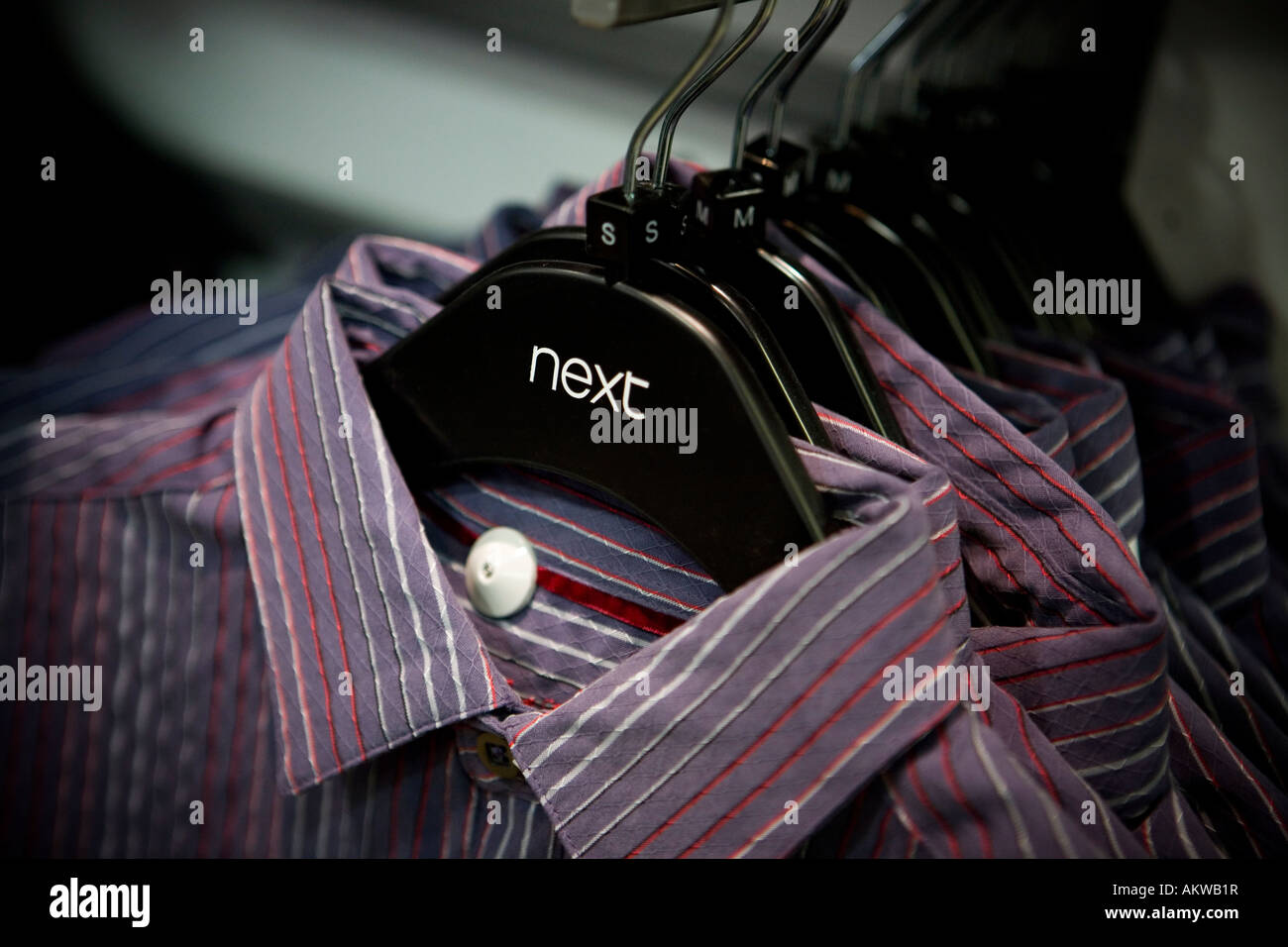 Clothes on hangars hi-res stock photography and images - Alamy