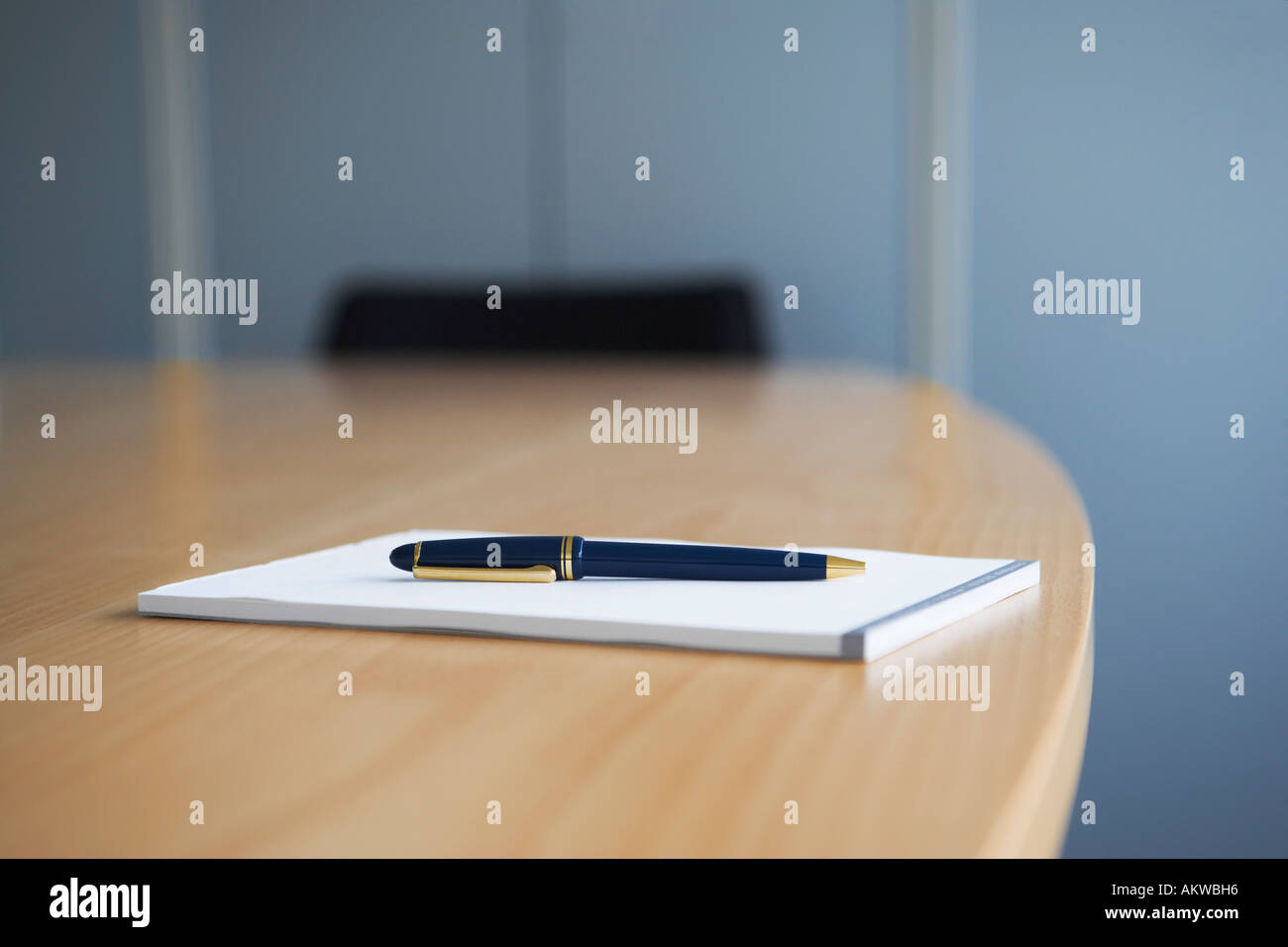 Ballpoint pen and notepad on conference table Stock Photo - Alamy