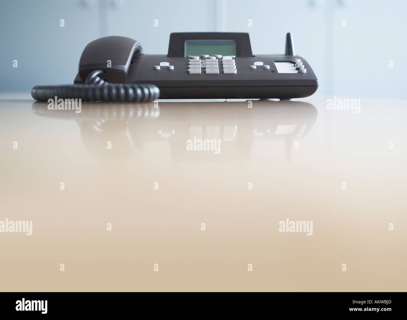 Telephone on desk Stock Photo - Alamy