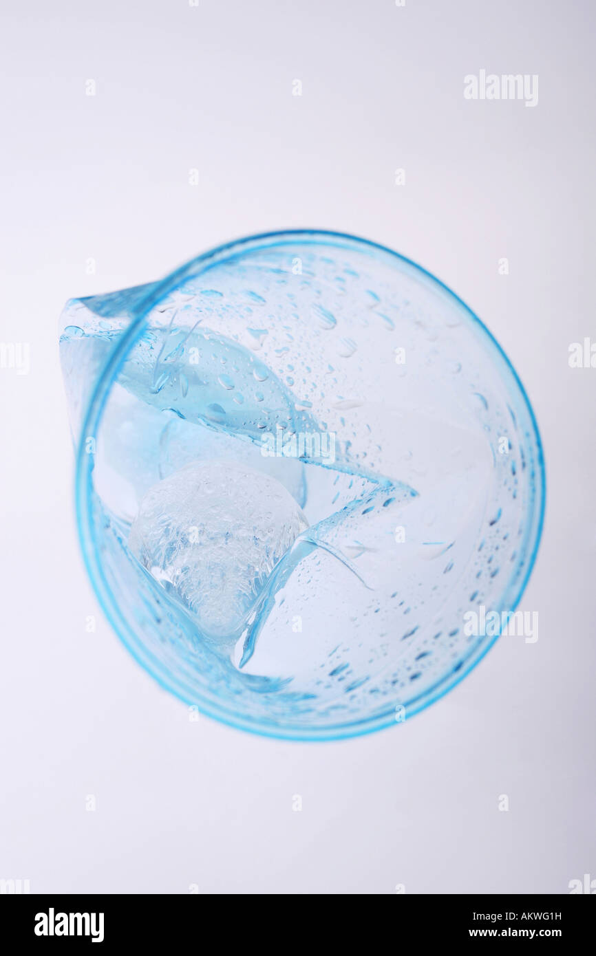 Clear blue plastic cup crumbled and broken Stock Photo - Alamy