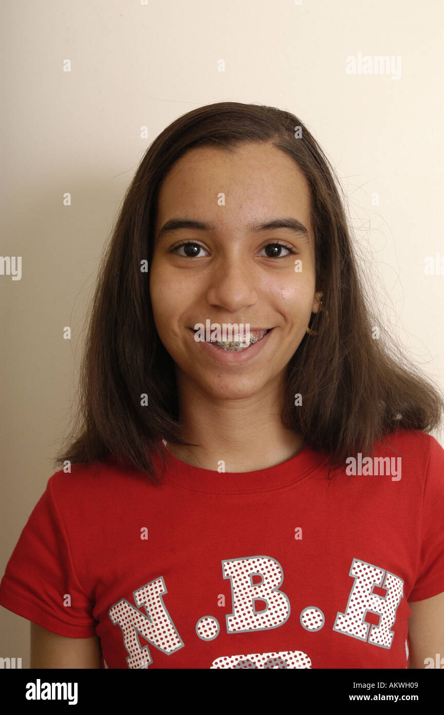 A portrait of a young, smiling Hispanic girl Stock Photo - Alamy