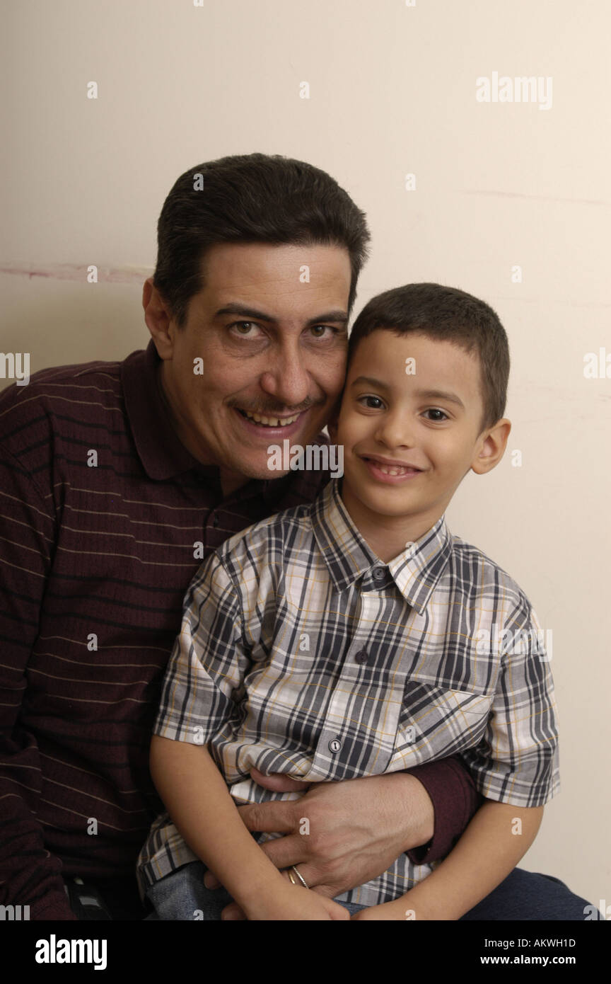 A portrait of a Hispanic father and son Stock Photo - Alamy