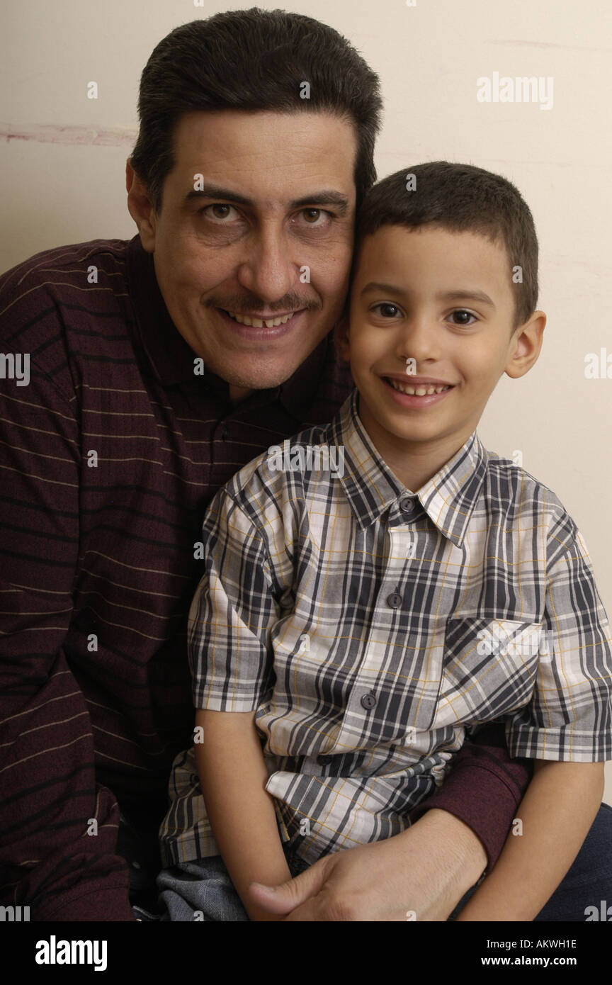 A portrait of a Hispanic father and son Stock Photo - Alamy