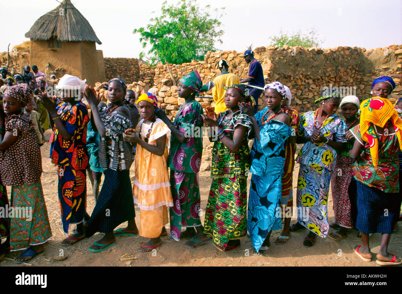 Dogon women dance in procession during a village celebration, Mali ...