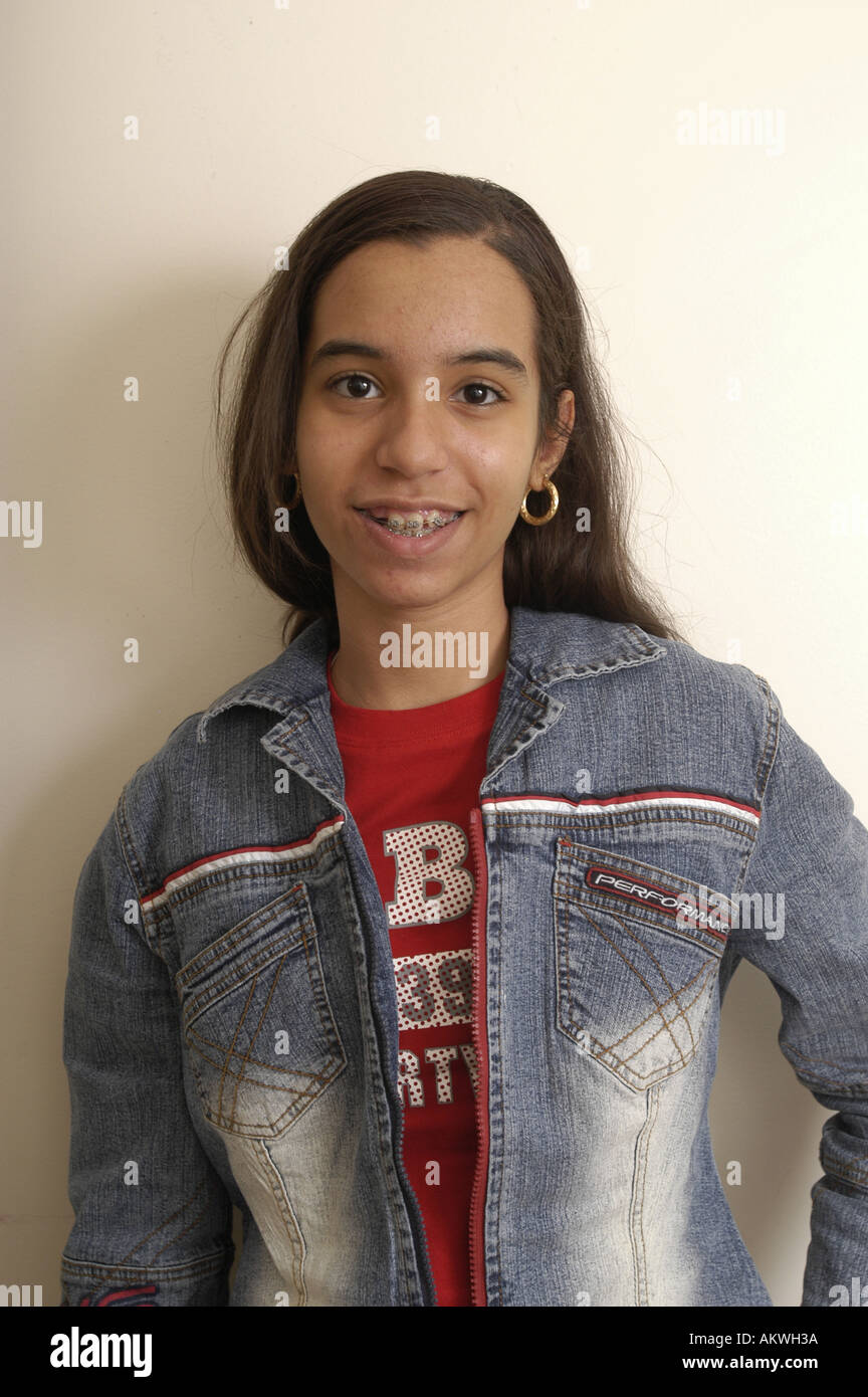 A portrait of a young, smiling Hispanic girl Stock Photo - Alamy