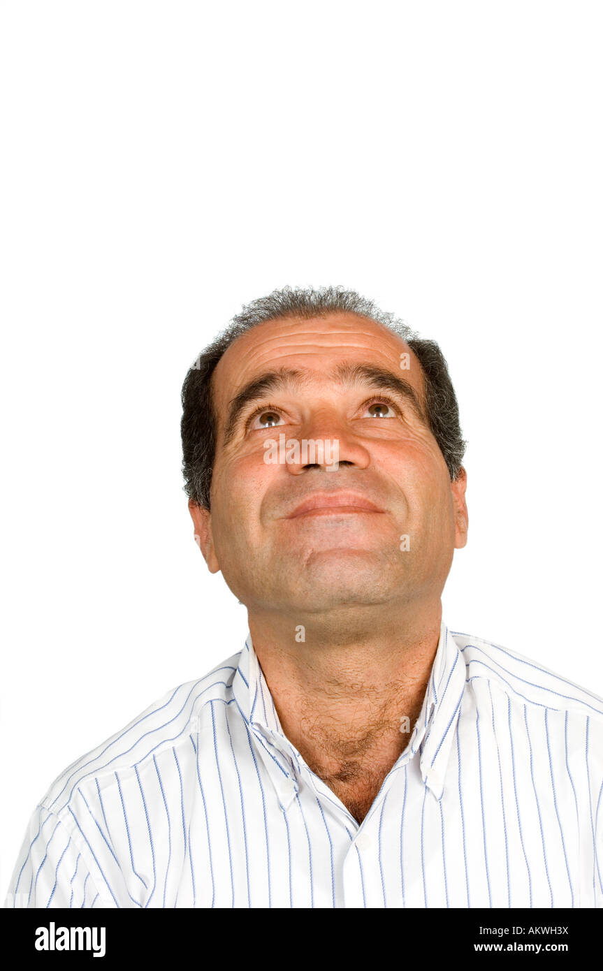 Smiling mature man looking up Stock Photo - Alamy