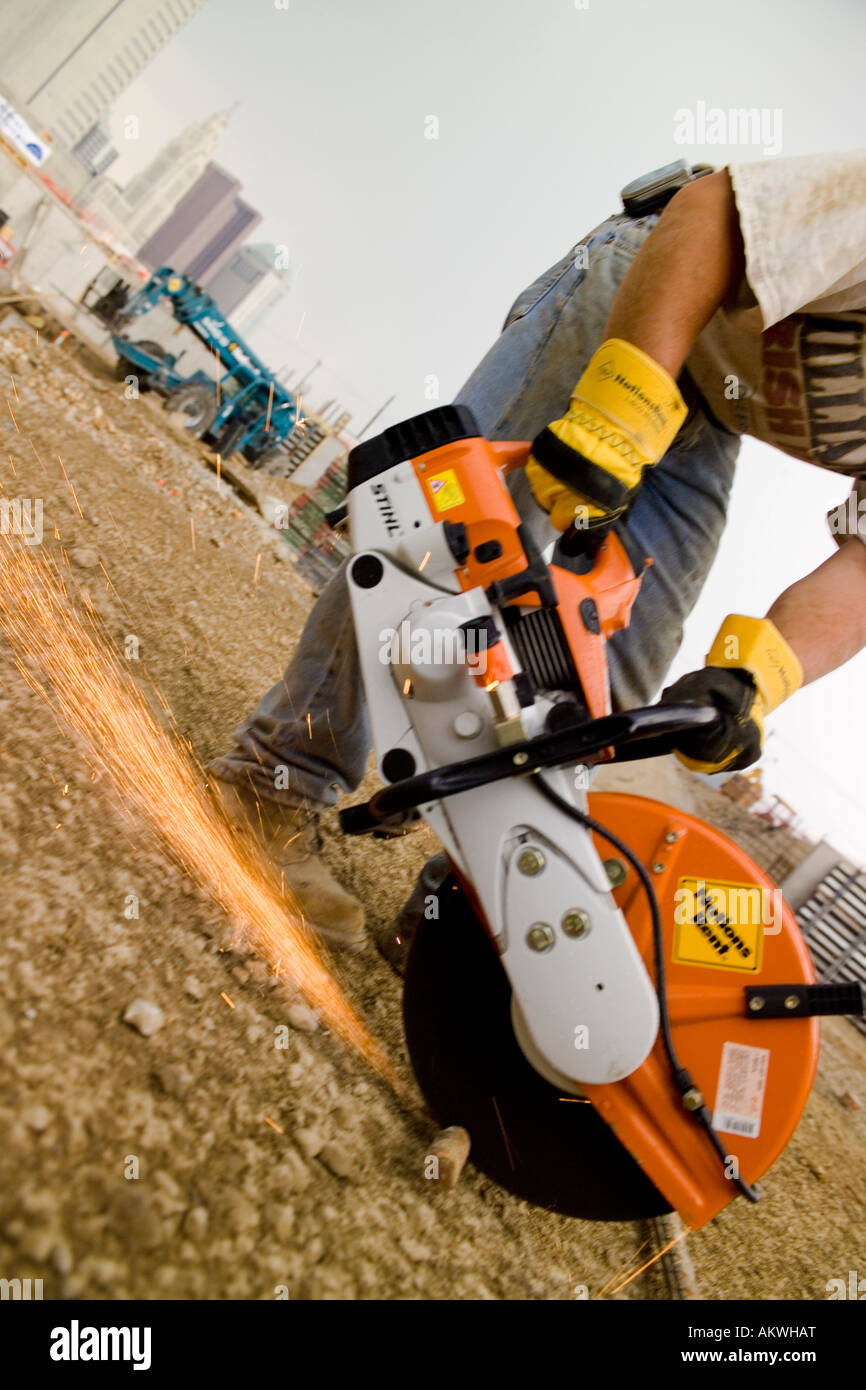 Contractor Cutting with Circular Saw Stock Photo - Alamy