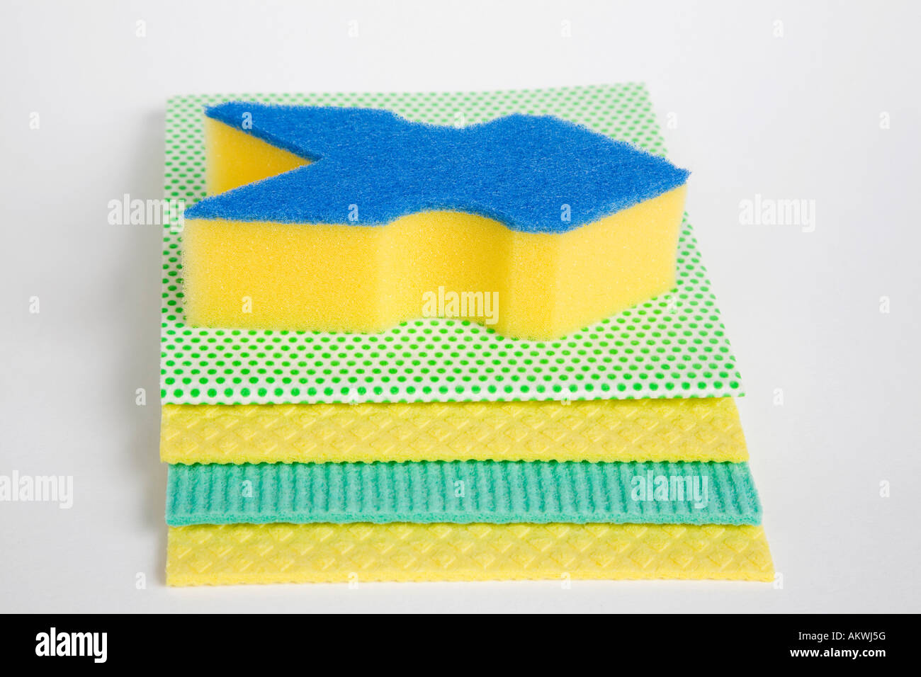 Sponge and clothes, close-up Stock Photo - Alamy