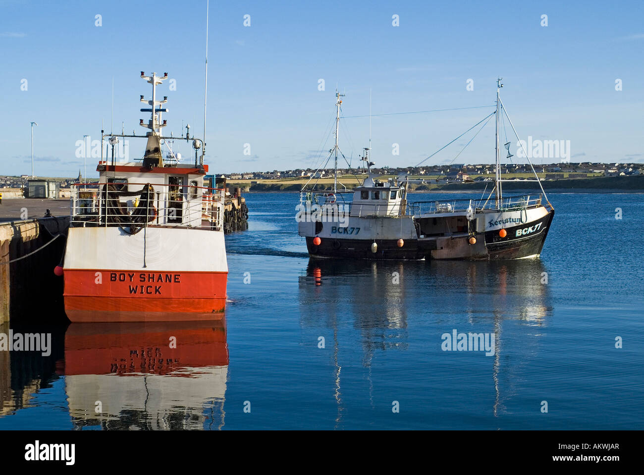 dh SCRABSTER CAITHNESS Fishing boat trawlers in Scrabster Harbour Stock ...