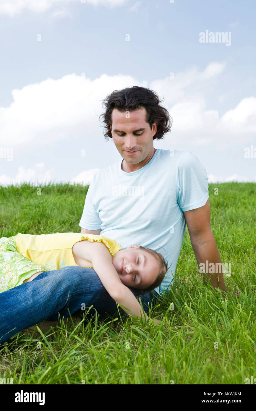 Girl sleeping on lap parent hi-res stock photography and images - Alamy