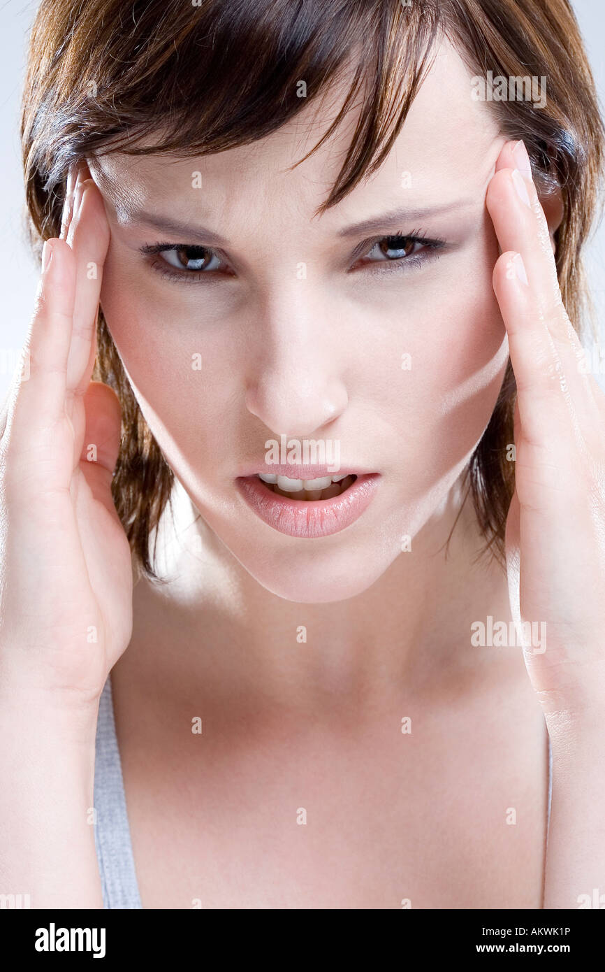 Woman, hands on head, portrait Stock Photo - Alamy