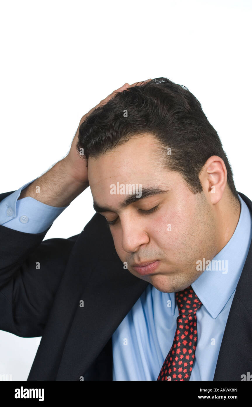 stressed businessman hand on head Stock Photo - Alamy