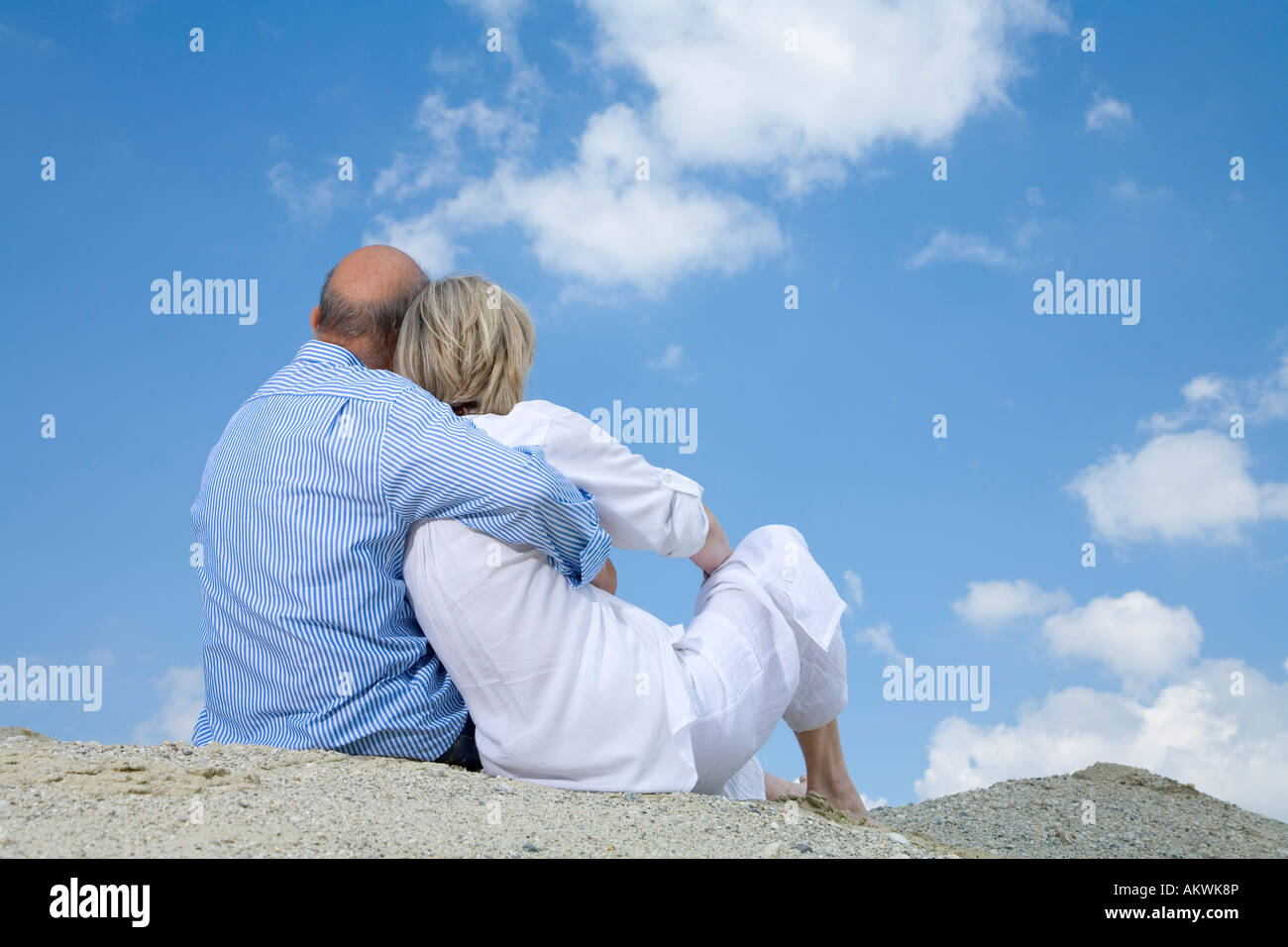 Older people hug rear view hi-res stock photography and images - Alamy