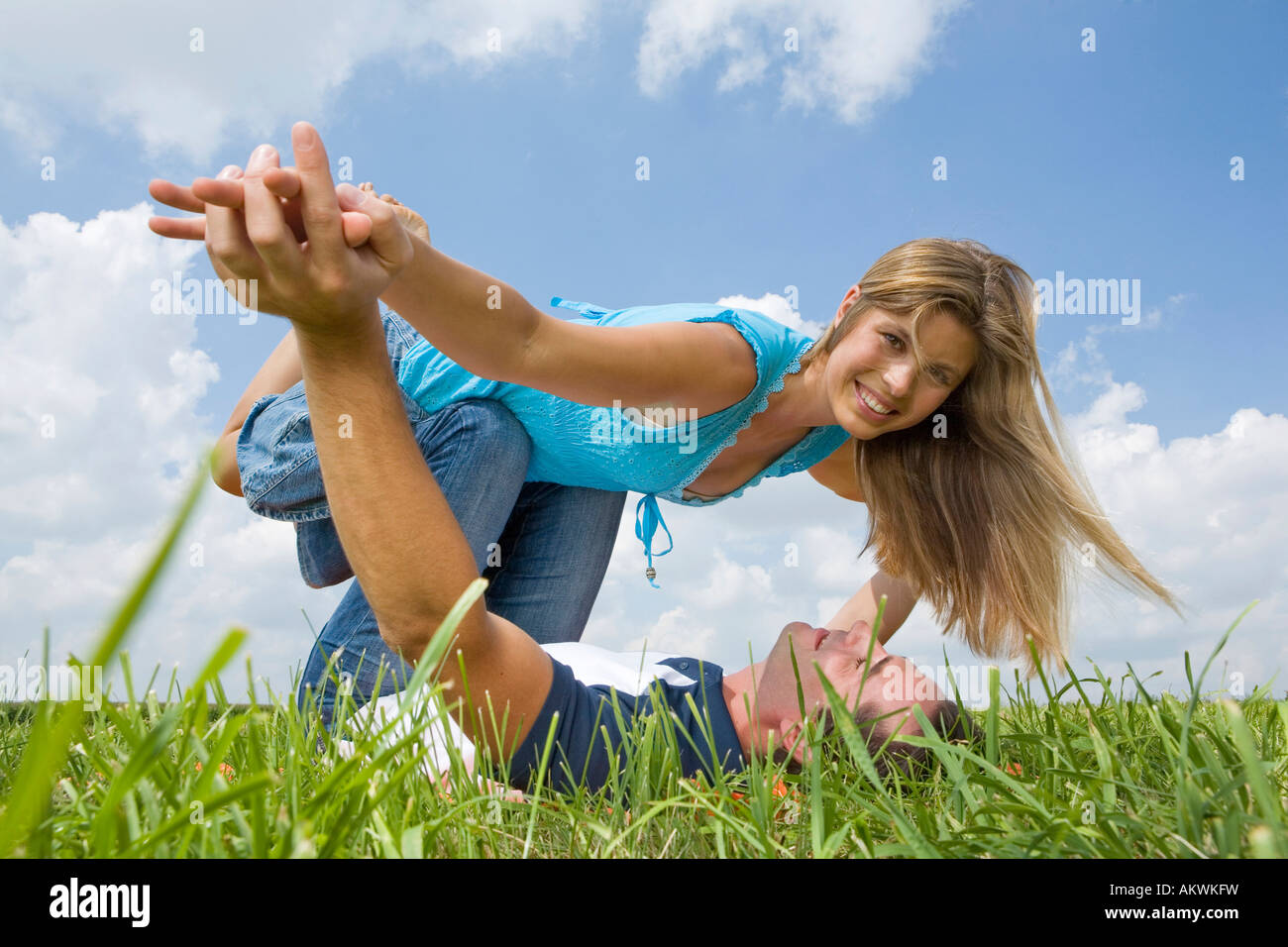 Man lifting woman Stock Photo - Alamy
