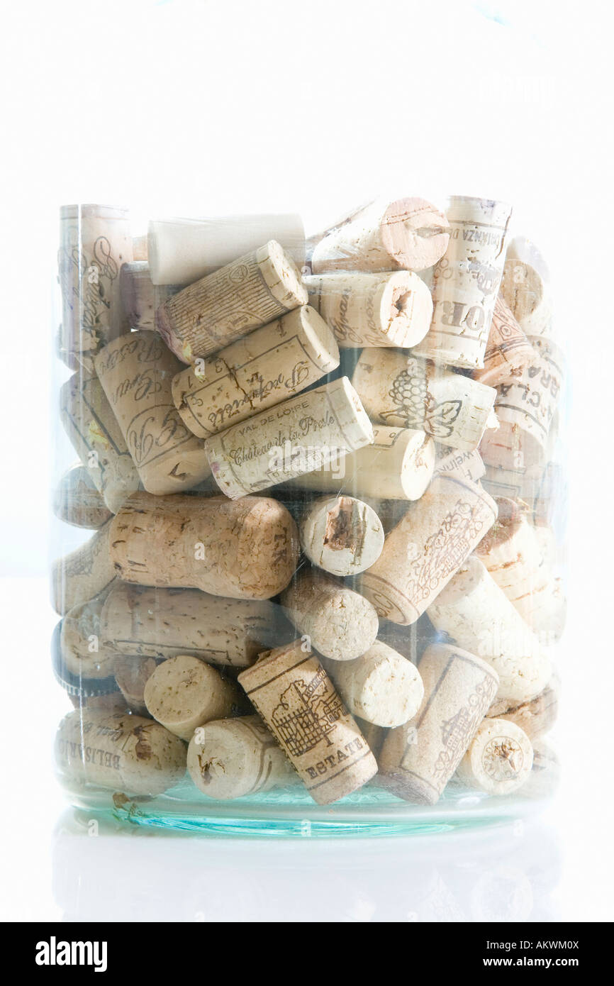 Glass flask containing corks, clpse-up Stock Photo - Alamy