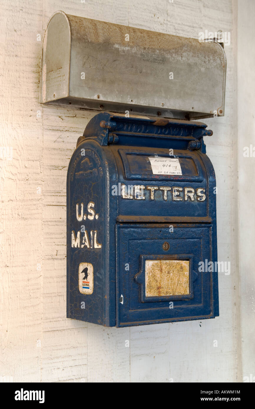 Rural U S mailboxes hanging on wall Stock Photo - Alamy