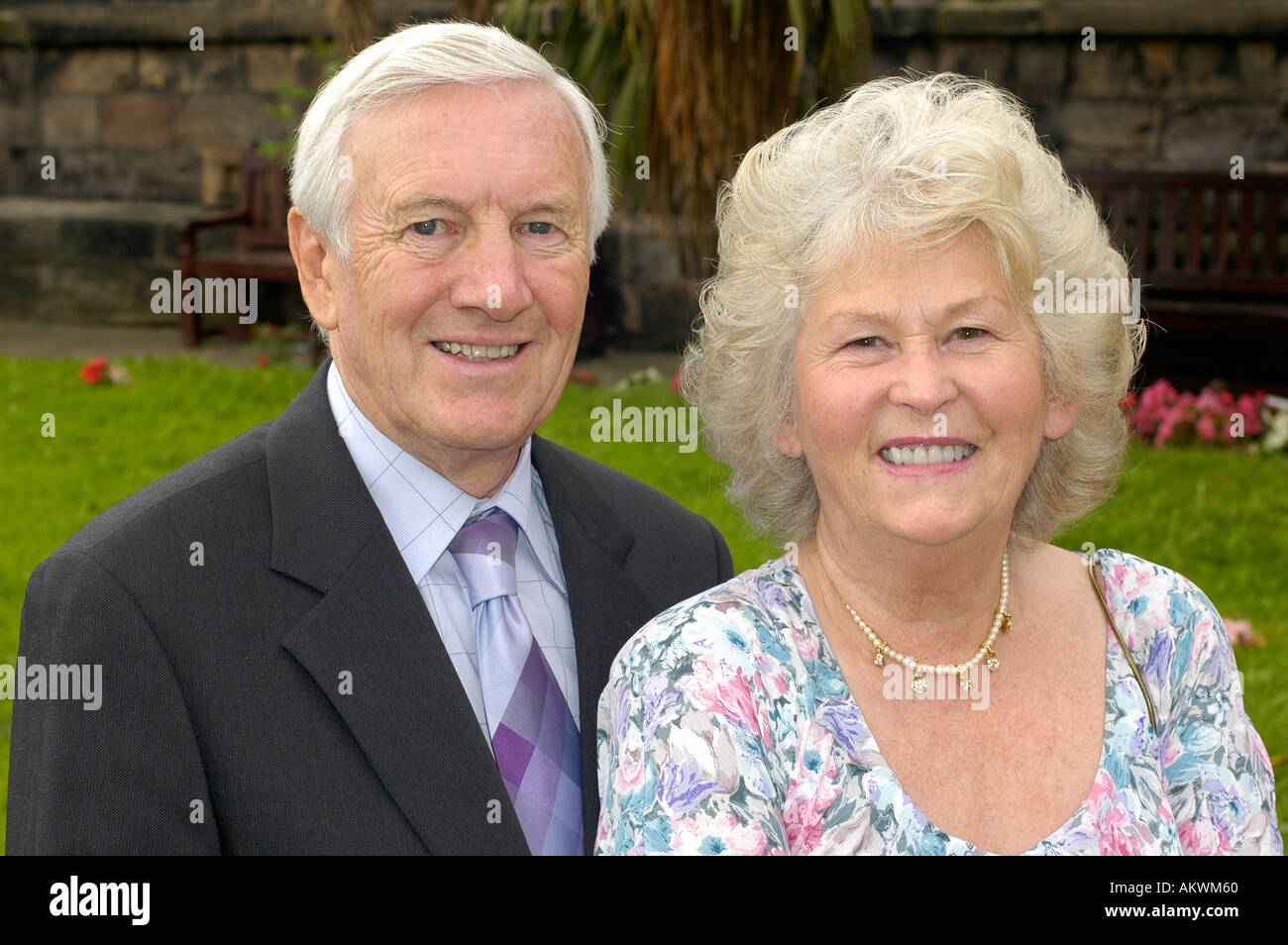 two people man and woman retired old grey hair smiling happy smartly ...