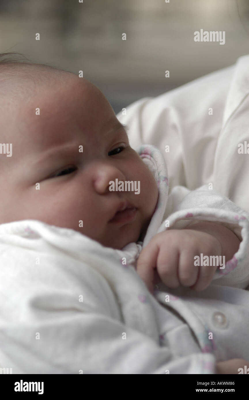 A young baby Stock Photo - Alamy
