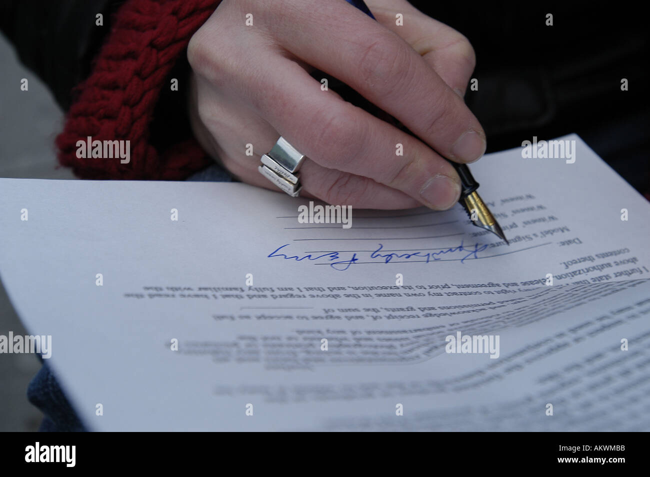 A close-up of a hand writing in a journal Stock Photo - Alamy