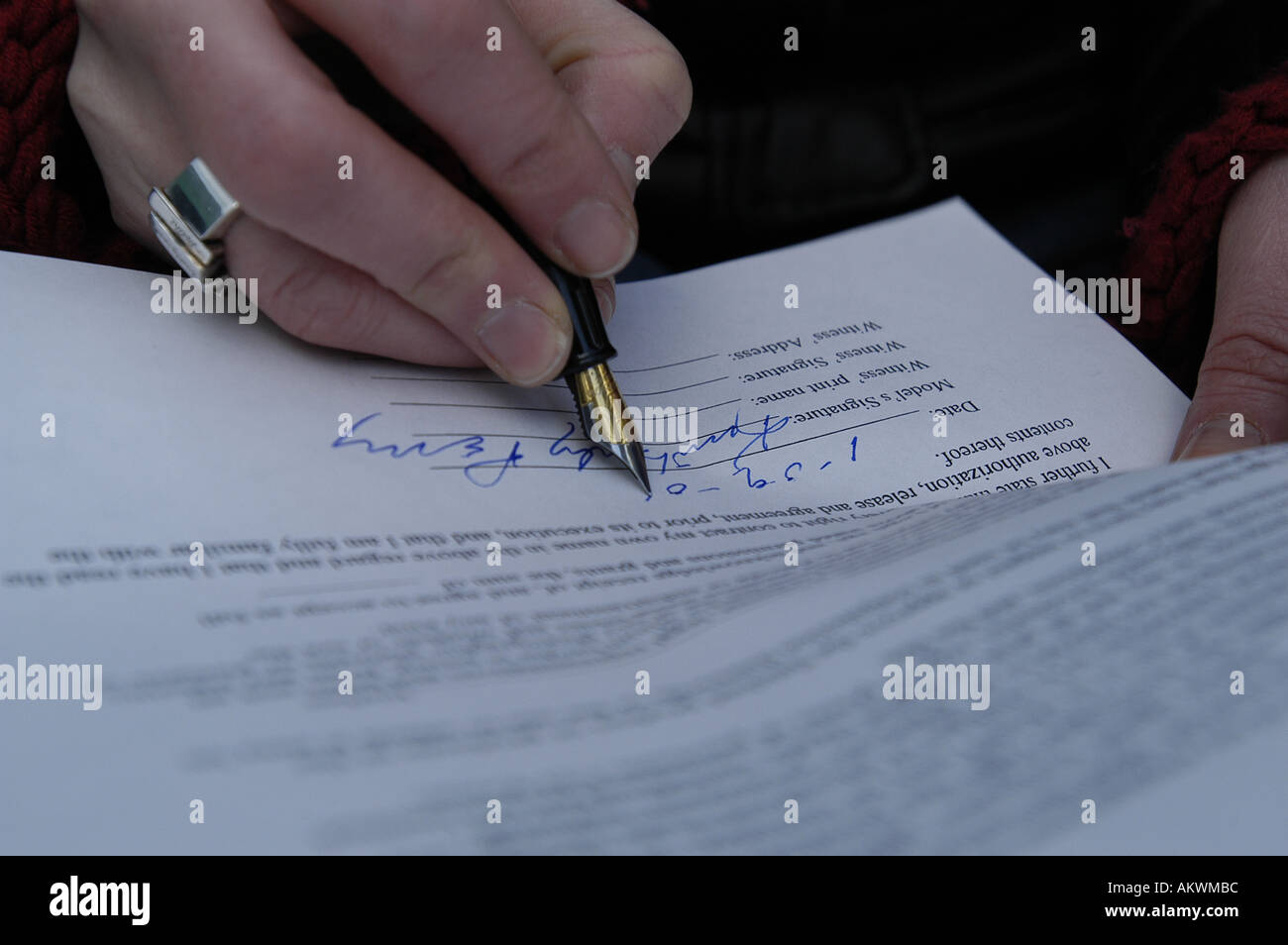 A close-up of a hand writing in a journal Stock Photo - Alamy
