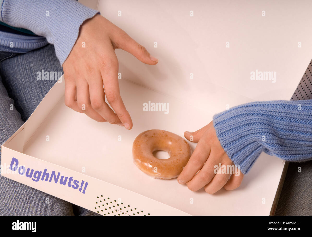 Two Caucasian Girls Reach for Last Doughnut Left in Box, USA Stock ...