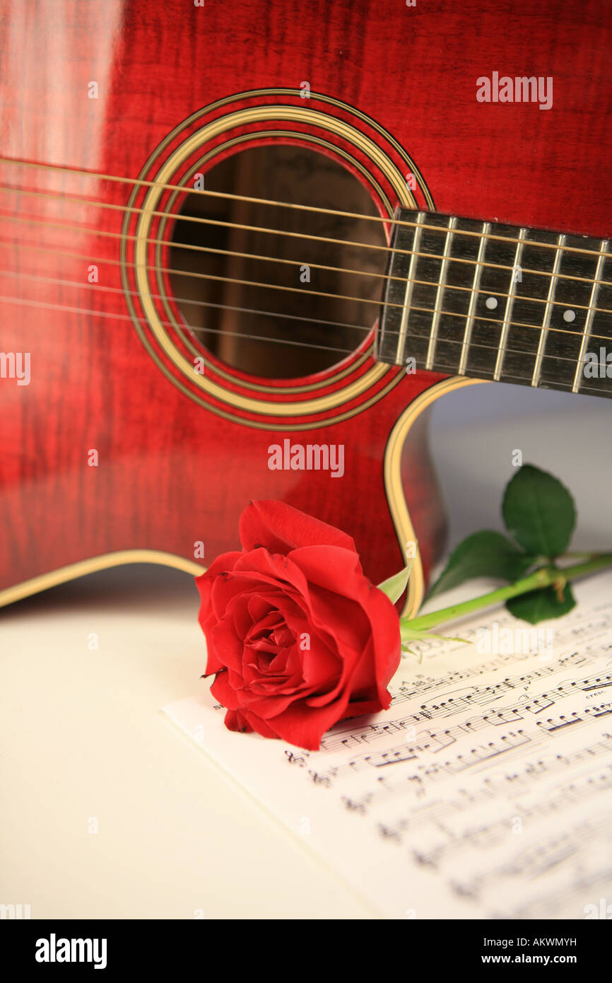 Red acoustic guitar red rose hi-res stock photography and images - Alamy