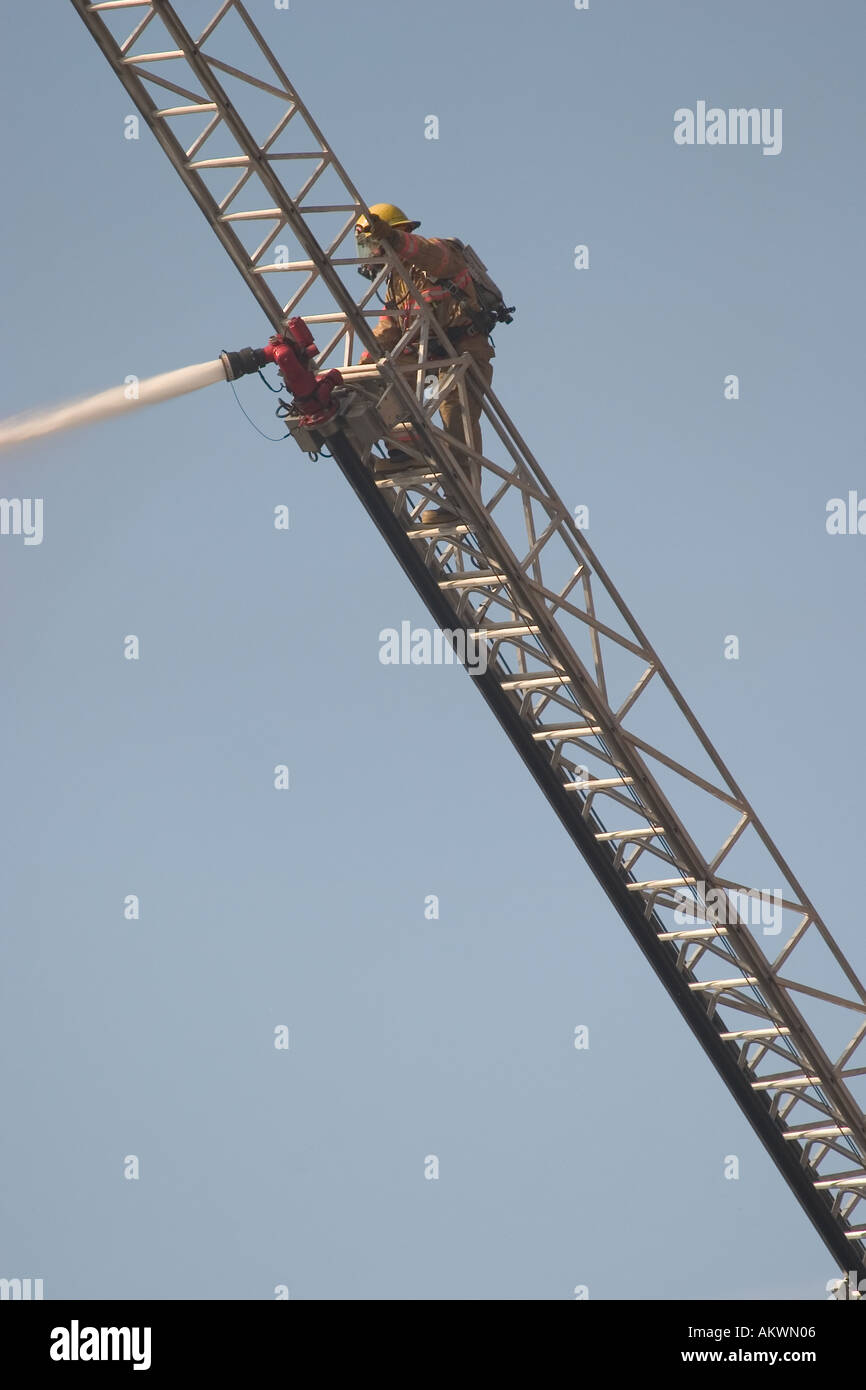 Water being sprayed on fire hi-res stock photography and images - Alamy