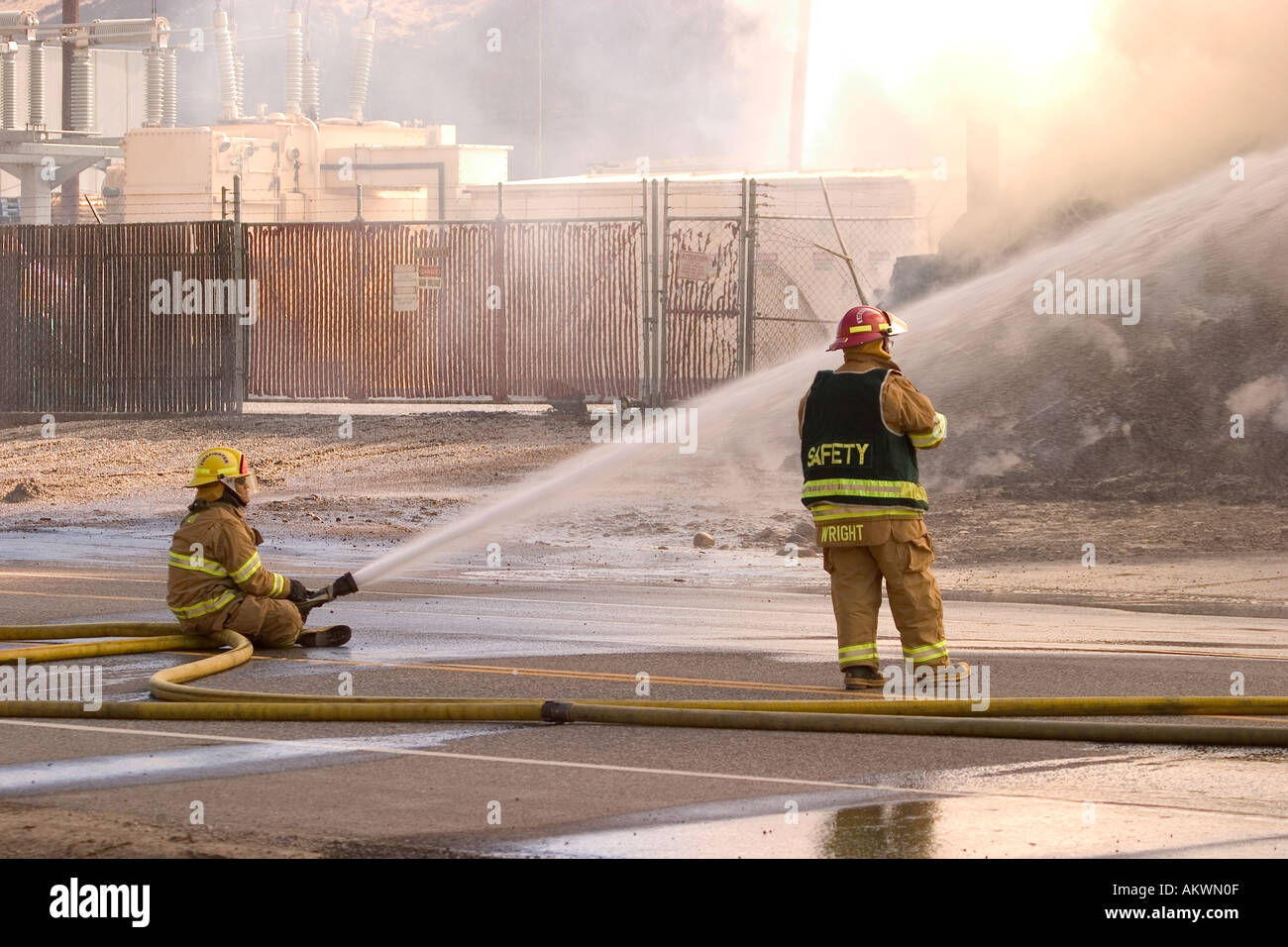 Water being sprayed on fire hi-res stock photography and images - Alamy