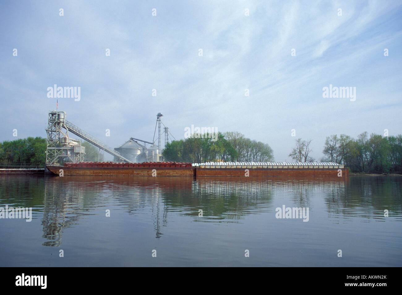 Grain loading facility and barges along the Illinois River In Illinois ...