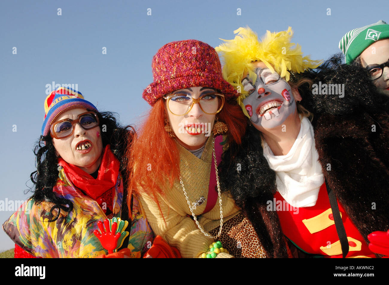 three scary faces bending over to the camera Stock Photo - Alamy