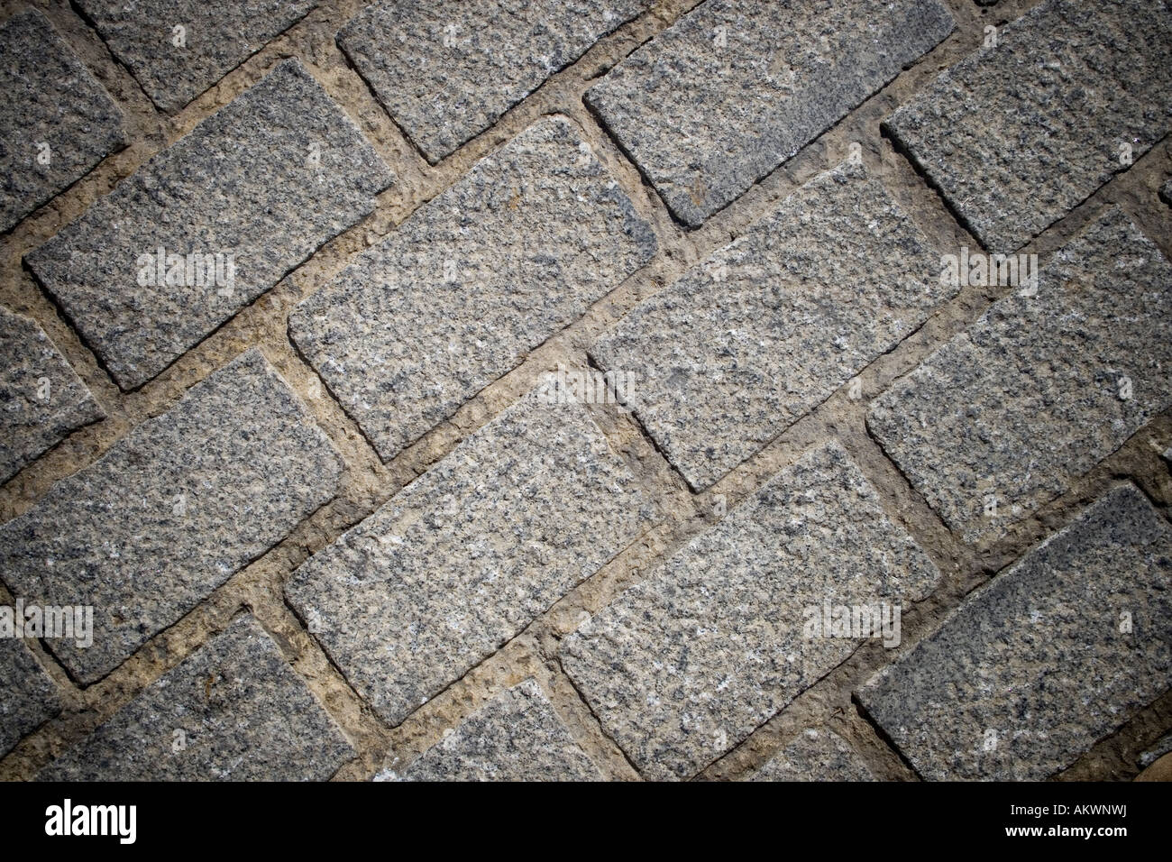 Medium granite paving stones in diagonal - texture Stock Photo - Alamy