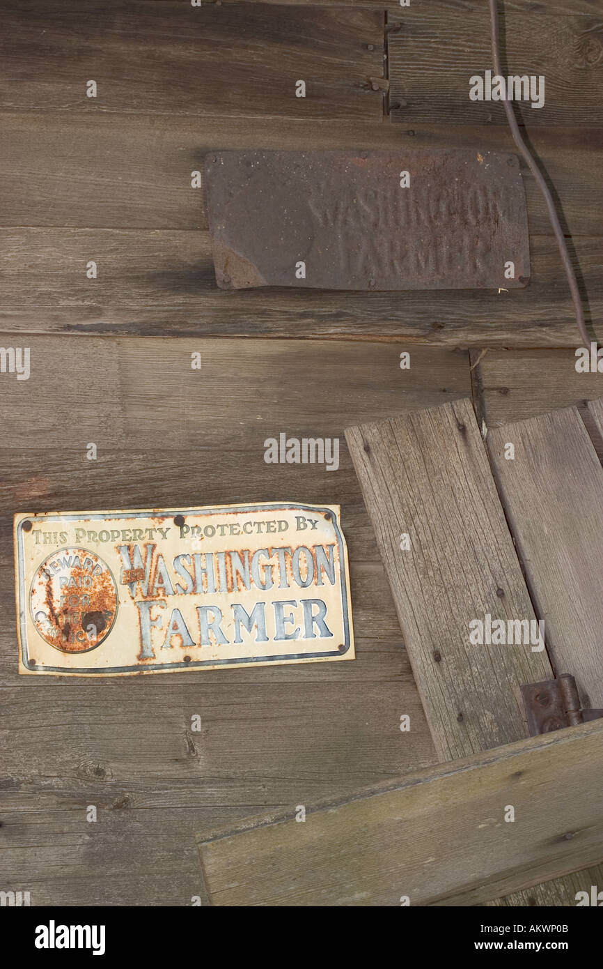 Old insurance signs on grandpa's barn Stock Photo - Alamy