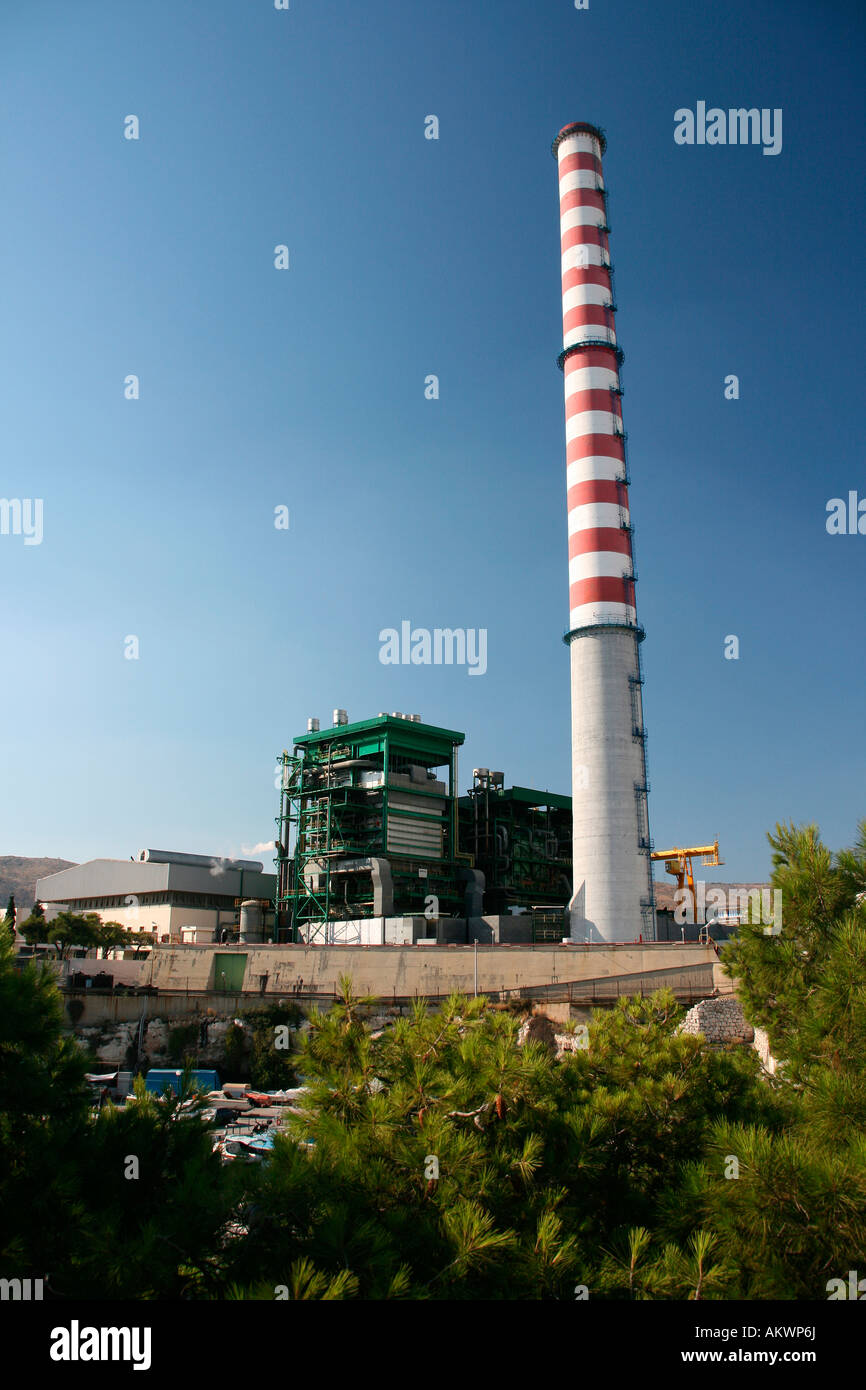 steam electric power plant with high red and white chimney at piraeus ...