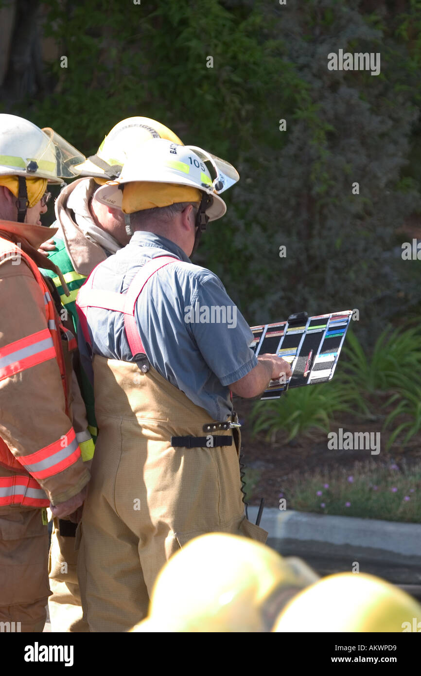 Fire fighters planning hi-res stock photography and images - Alamy