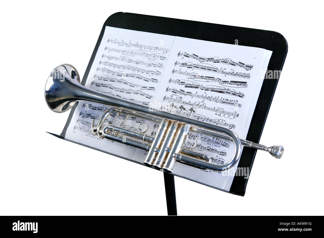 Trumpet on music stand with sheet music isolated on white Stock Photo ...