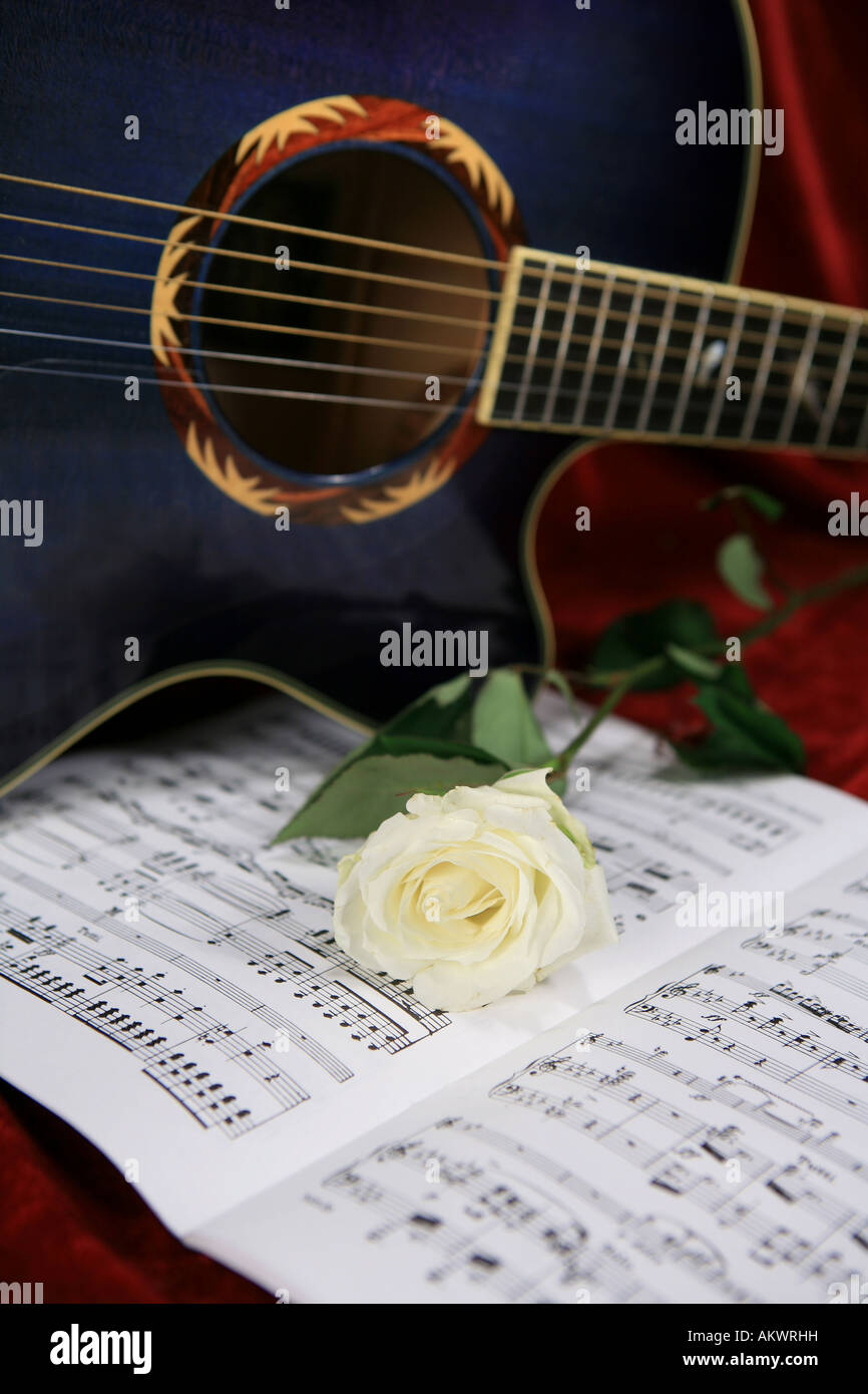 Blue acoustic guitar white rose hi-res stock photography and images - Alamy