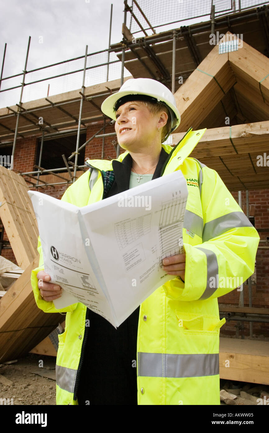 Female building surveyor inspecting a new development Stock Photo - Alamy