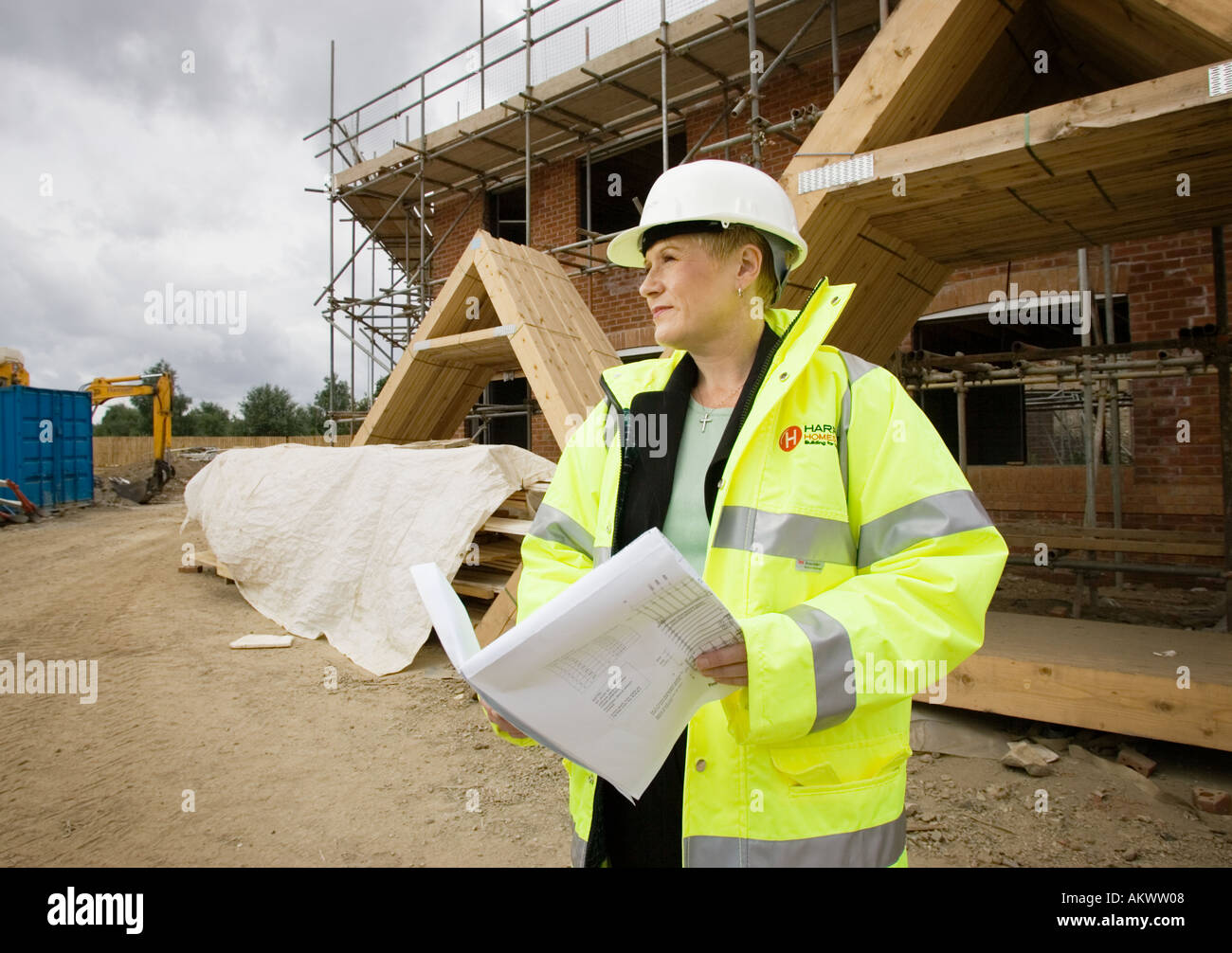 Surveyor with building plans hi-res stock photography and images - Alamy