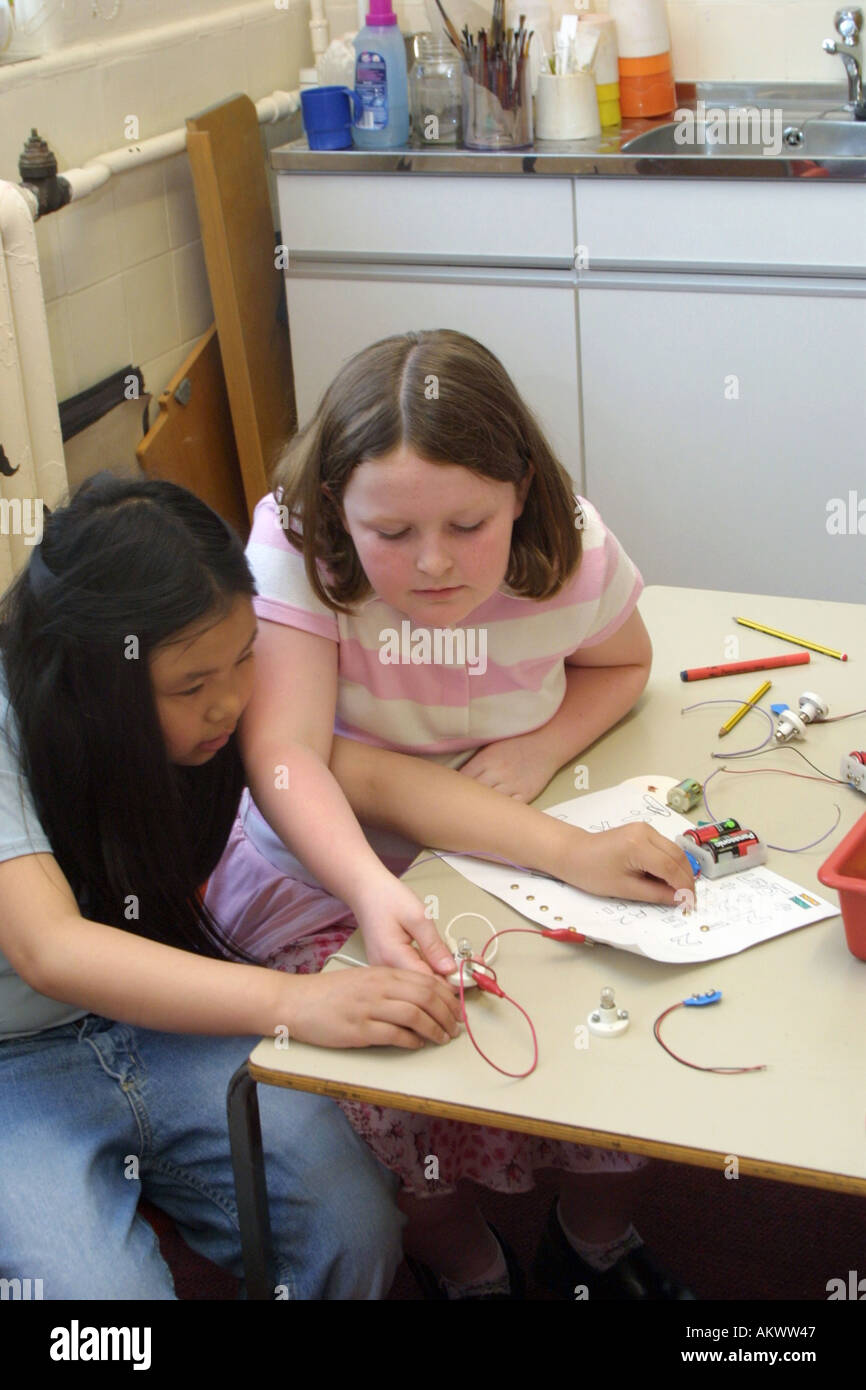 primary children working on science project in classroom Stock Photo ...