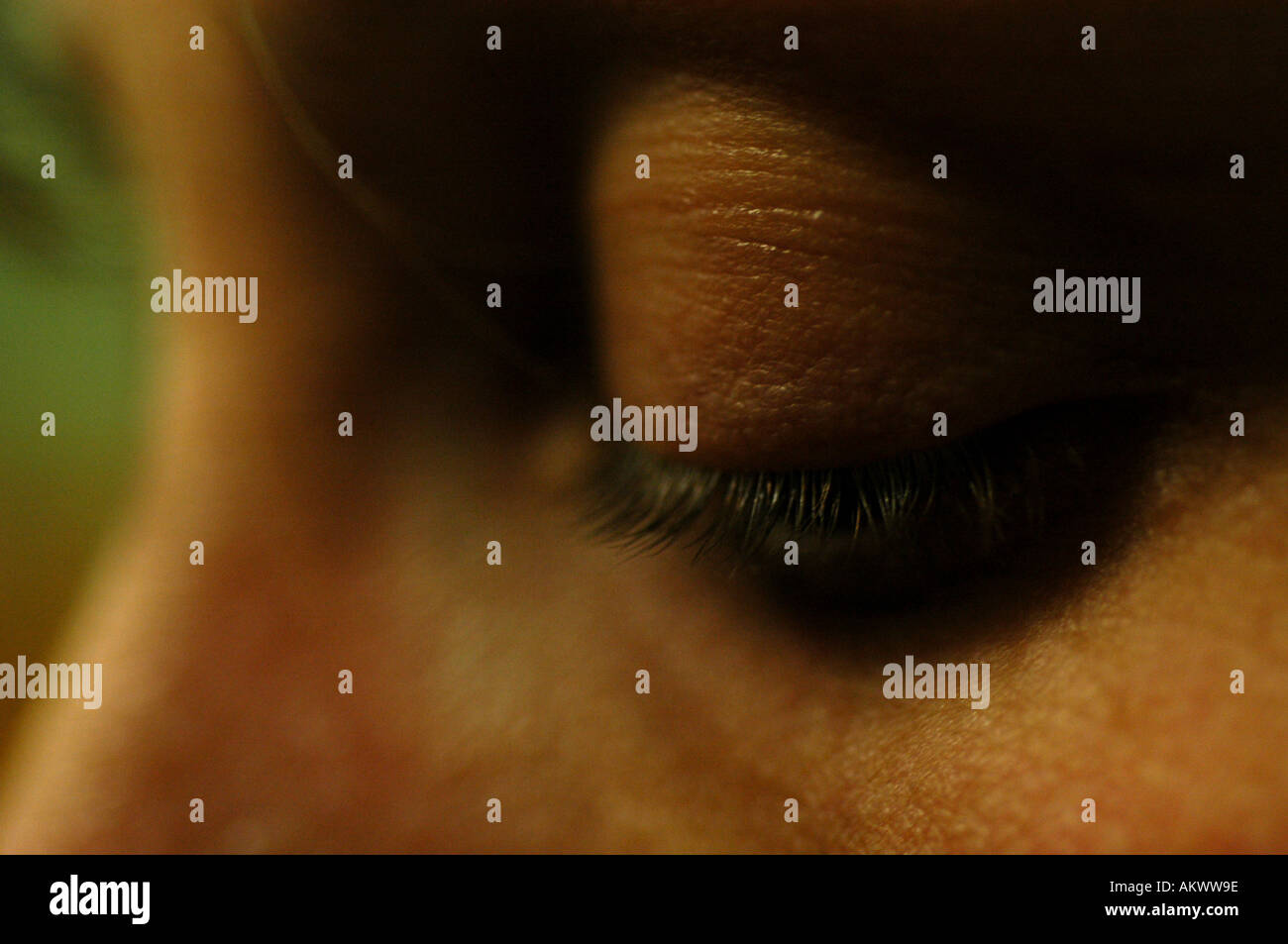 Half closed eye hi-res stock photography and images - Alamy