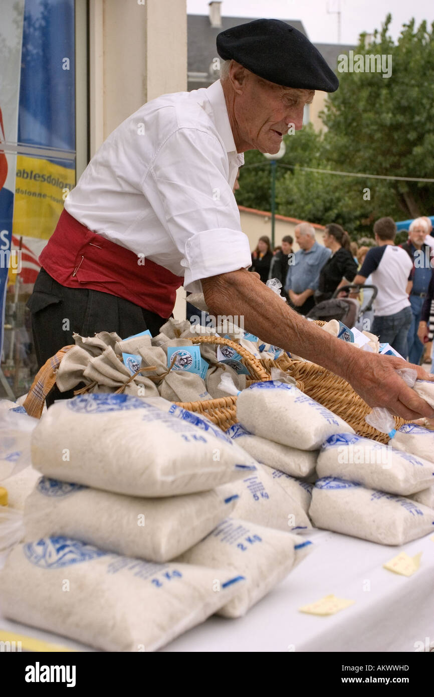 old man selling salt in france Stock Photo - Alamy