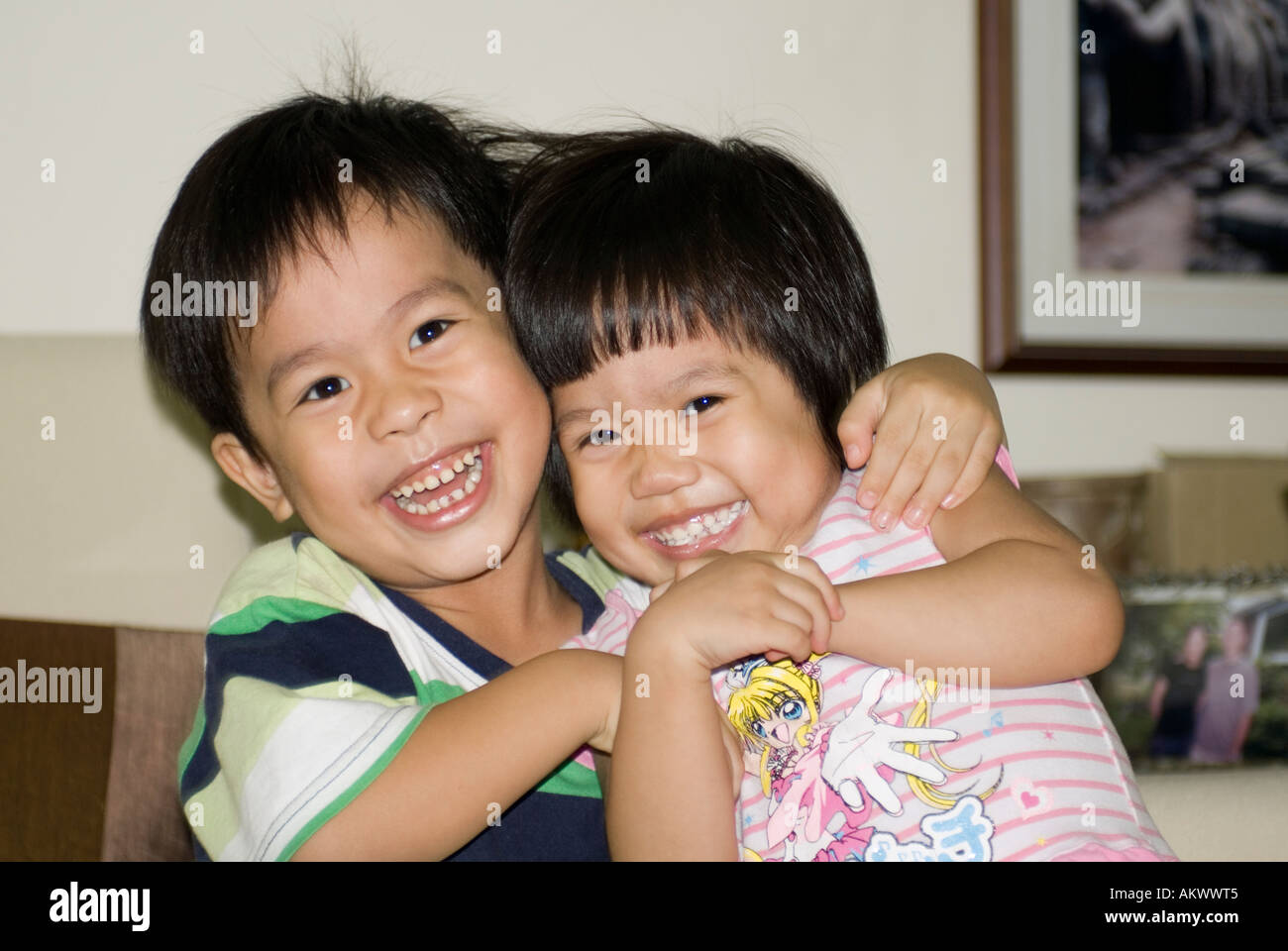 Portrait Of A Young Asian Brother And Sister Hugging Taiwan China Stock ...