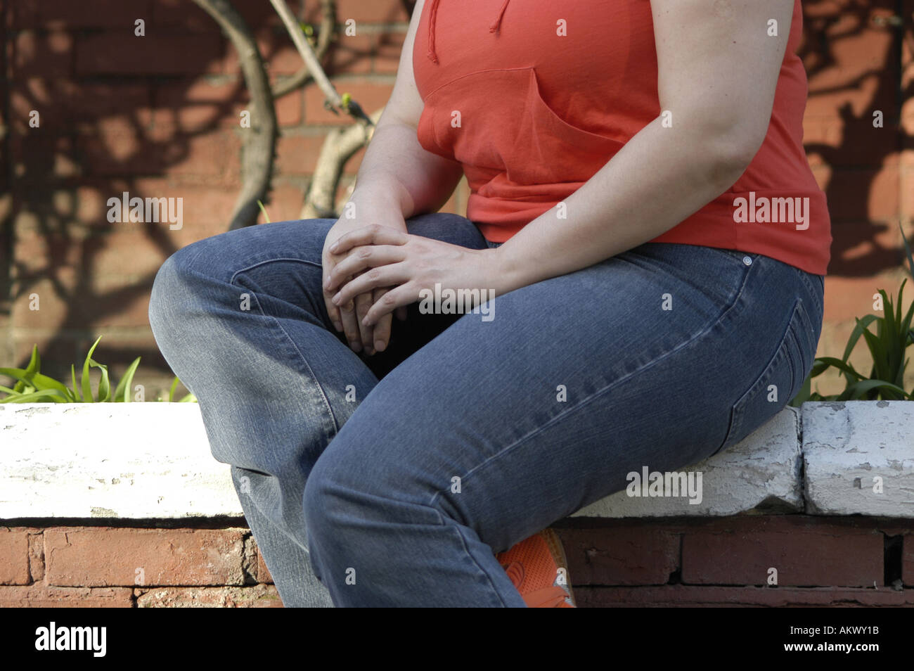 A person's folded hands Stock Photo - Alamy