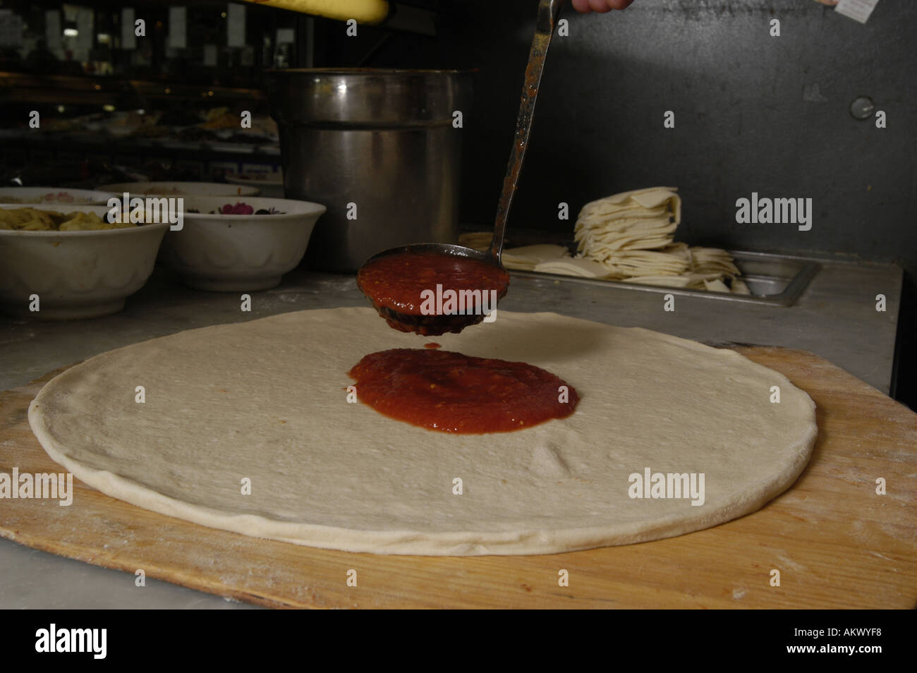 Preparation of a pizza Stock Photo - Alamy