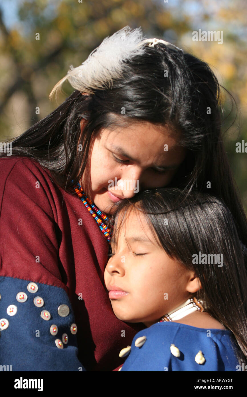 A Native American Indian mother hugging her child Stock Photo - Alamy