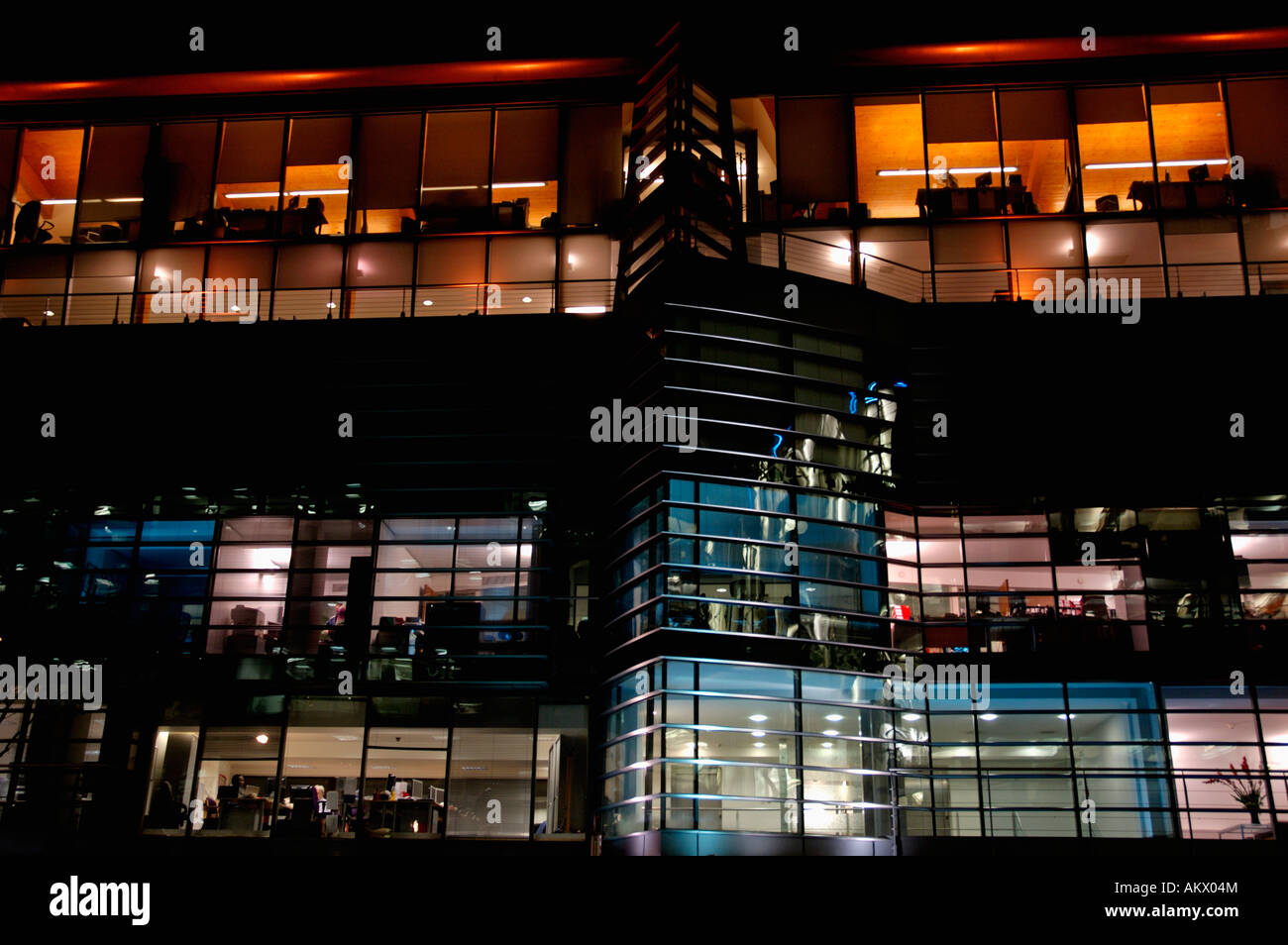 London office buildings lit up by fluorescent lights at night Stock ...
