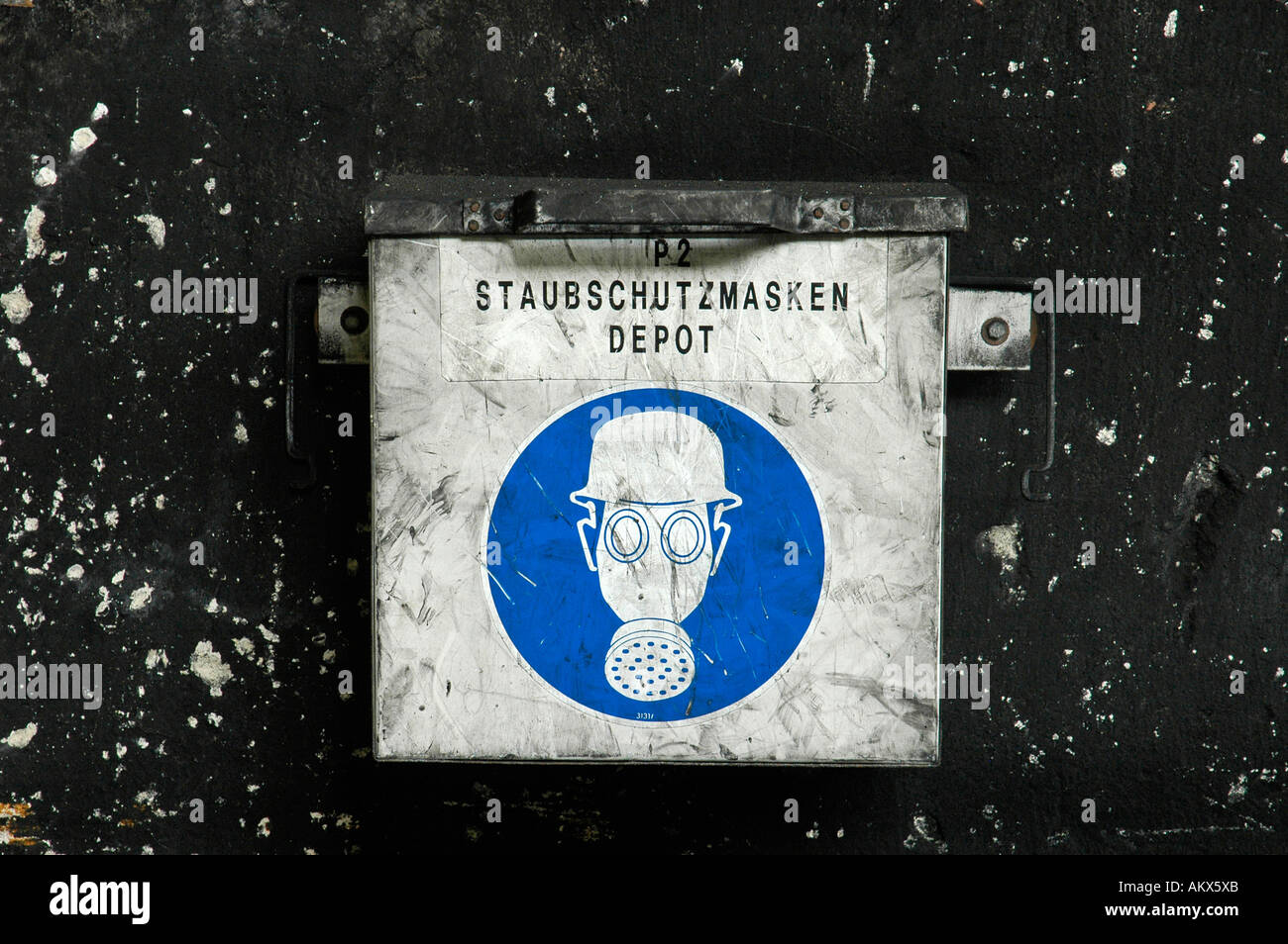 Sign for a dust protection mask storage Stock Photo - Alamy