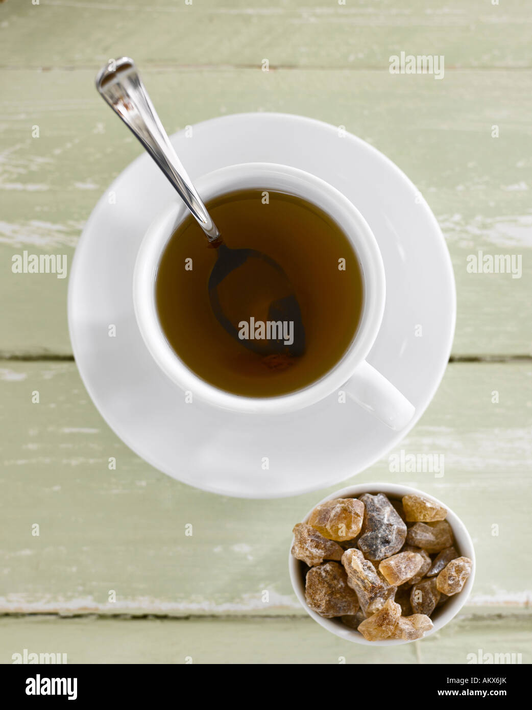 Cup of tea with candy, elevated view Stock Photo - Alamy